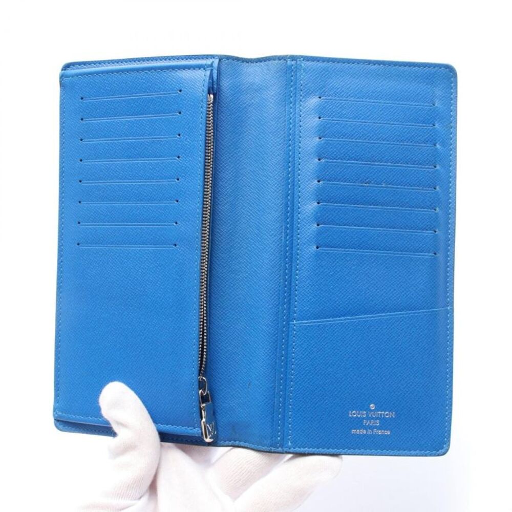 Louis Vuitton | Bags | Louis Vuitton Portefeuille Brazza Taiga Long ...